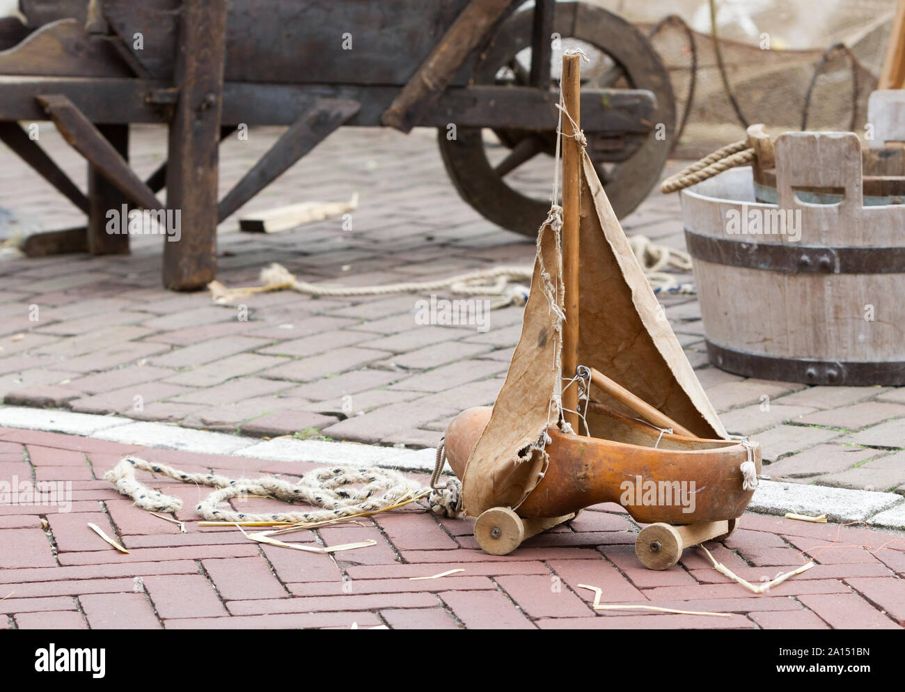 Old dutch clog made into a toy, sailing boat Stock Photo - Alamy