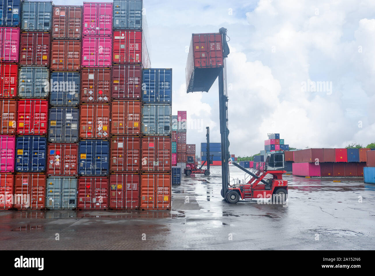 Container lifting work in a boat after the rain Stock Photo - Alamy