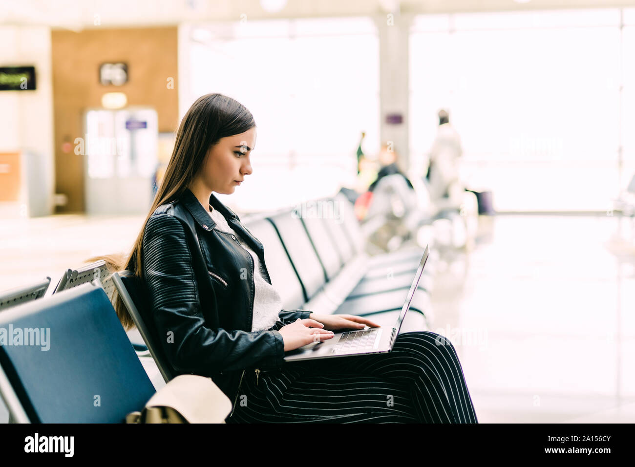 Asian laptop airport hi-res stock photography and images - Alamy