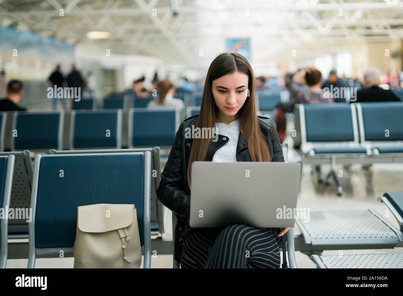Asian laptop airport hi-res stock photography and images - Alamy