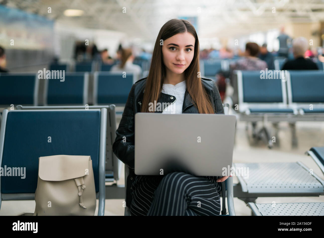 Asian laptop airport hi-res stock photography and images - Alamy