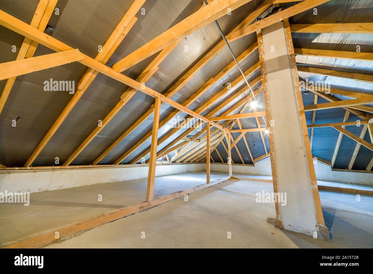 Attic of a building with wooden beams of a roof structure Stock Photo ...