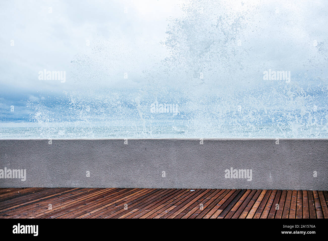 Strong waves bounce against wave protection, breakwater, Sea Point ...