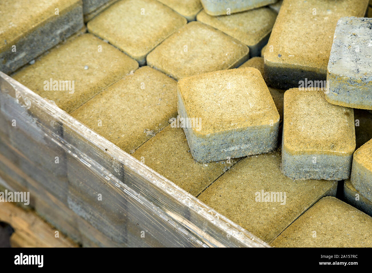 Installation of stone paving slabs in a yard Stock Photo - Alamy