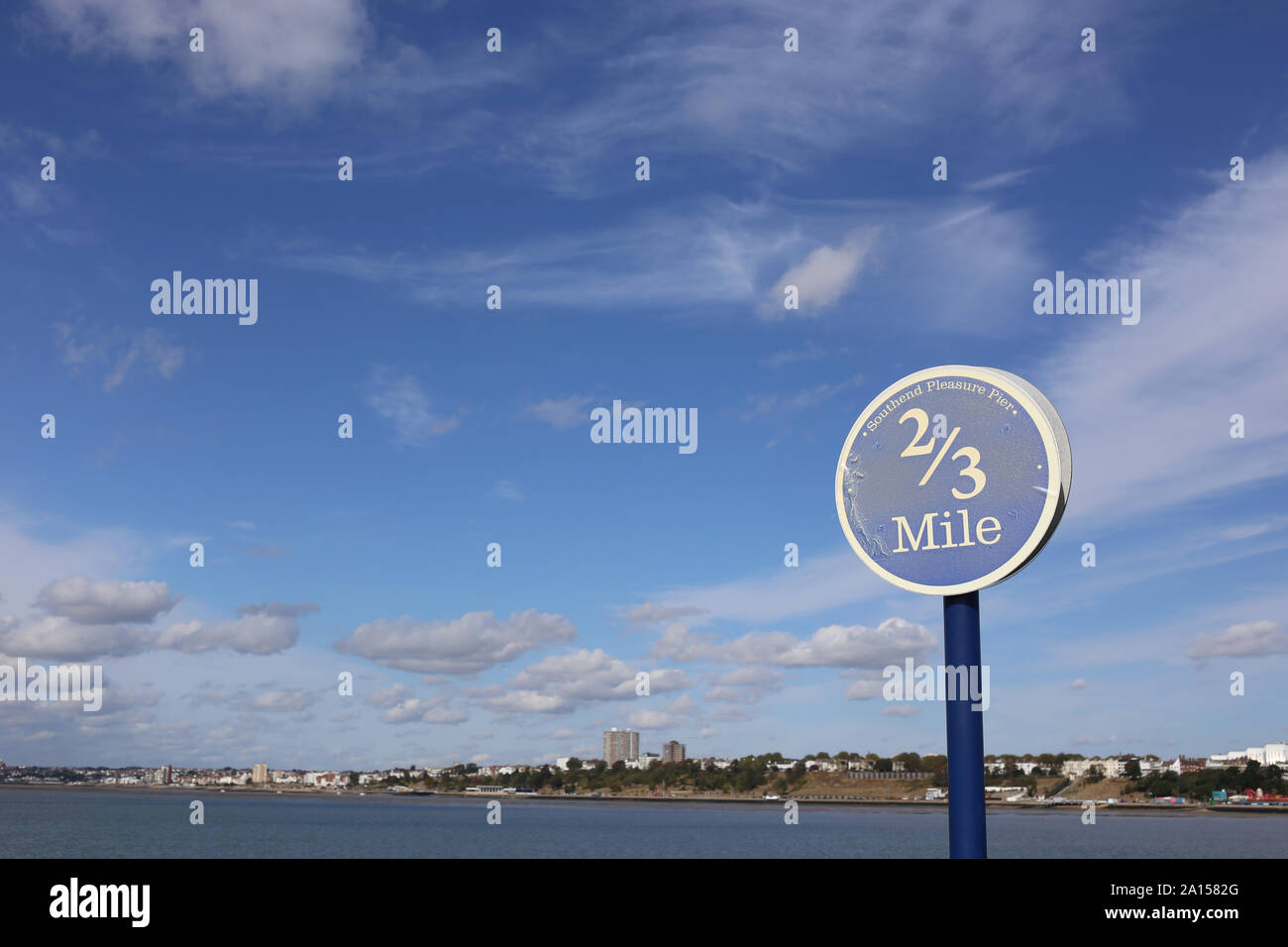 A 2/3 mile distance marker / circular sign on the pier at Southend-on ...