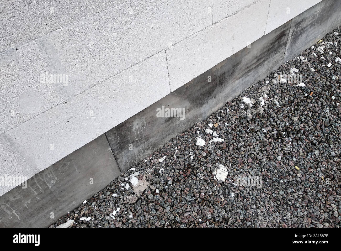 Facade of white block building under construction works Stock Photo - Alamy