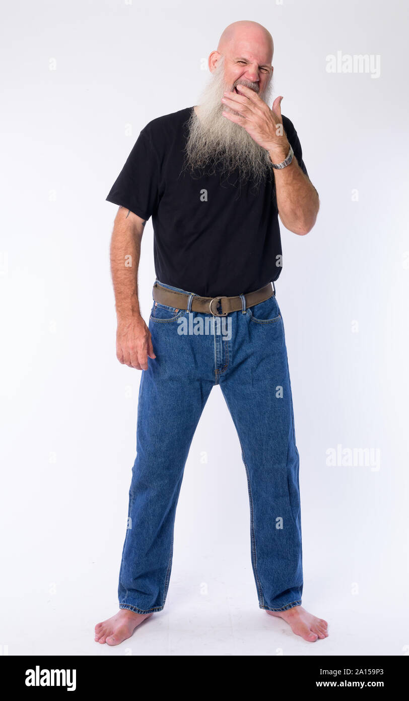 Mature bald man covering mouth hi-res stock photography and images - Alamy
