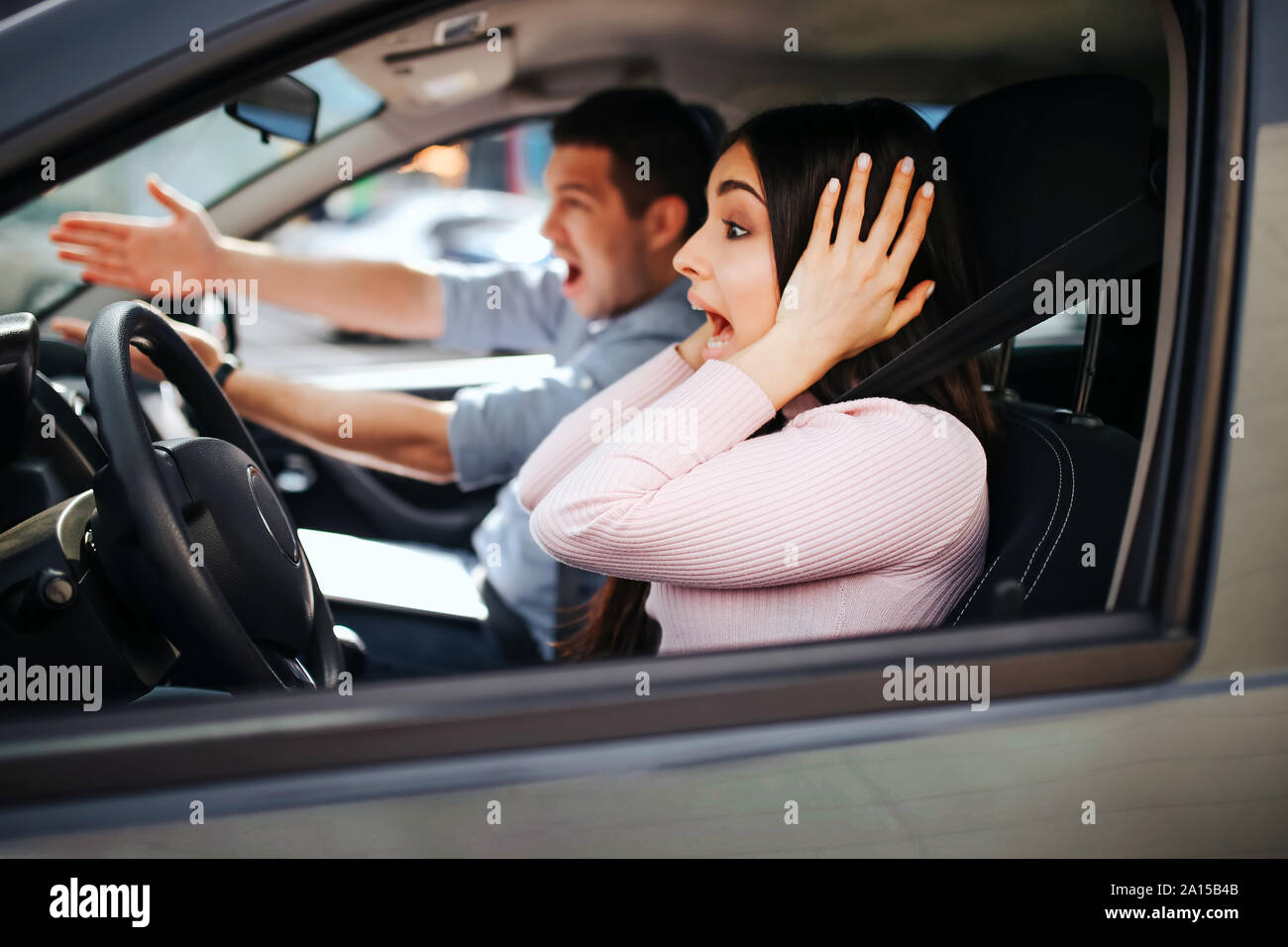 Man driving car yelling hi-res stock photography and images - Alamy