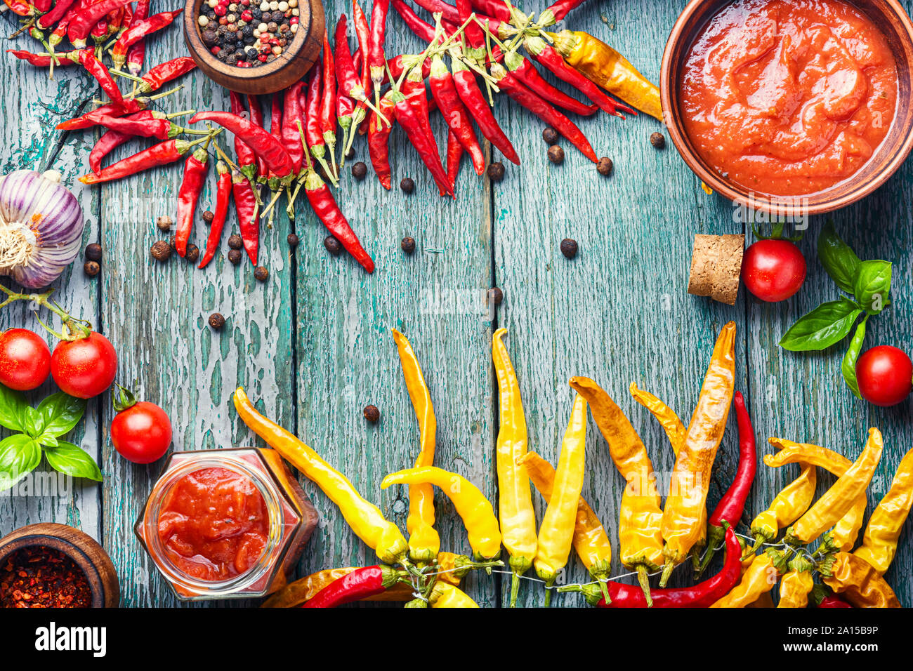 Spicy hot chili sauce with of chilli pepper Stock Photo - Alamy