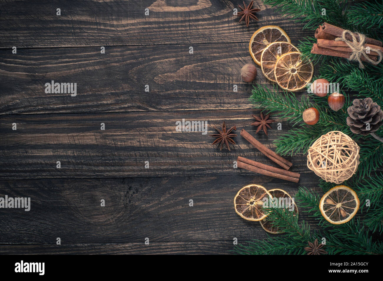 Christmas food background with spices and nuts on dark wooden ta Stock ...