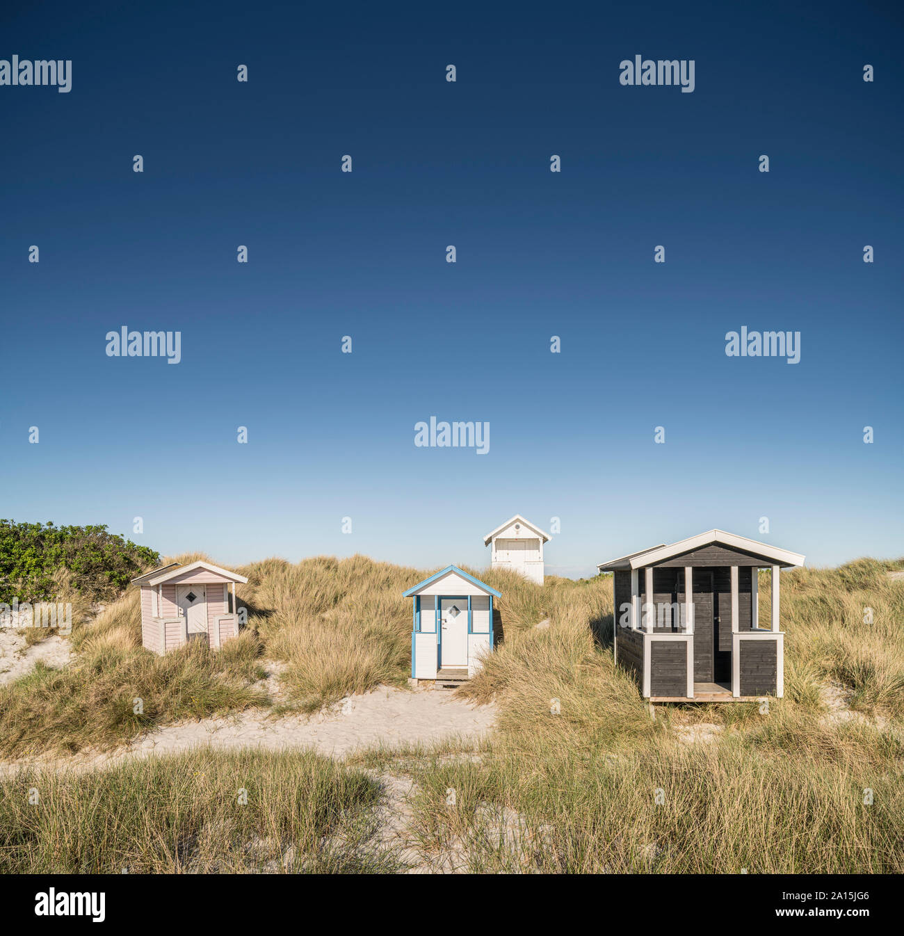 Beach huts and sand dunes at the beach at Skanor, Skane, Sweden ...