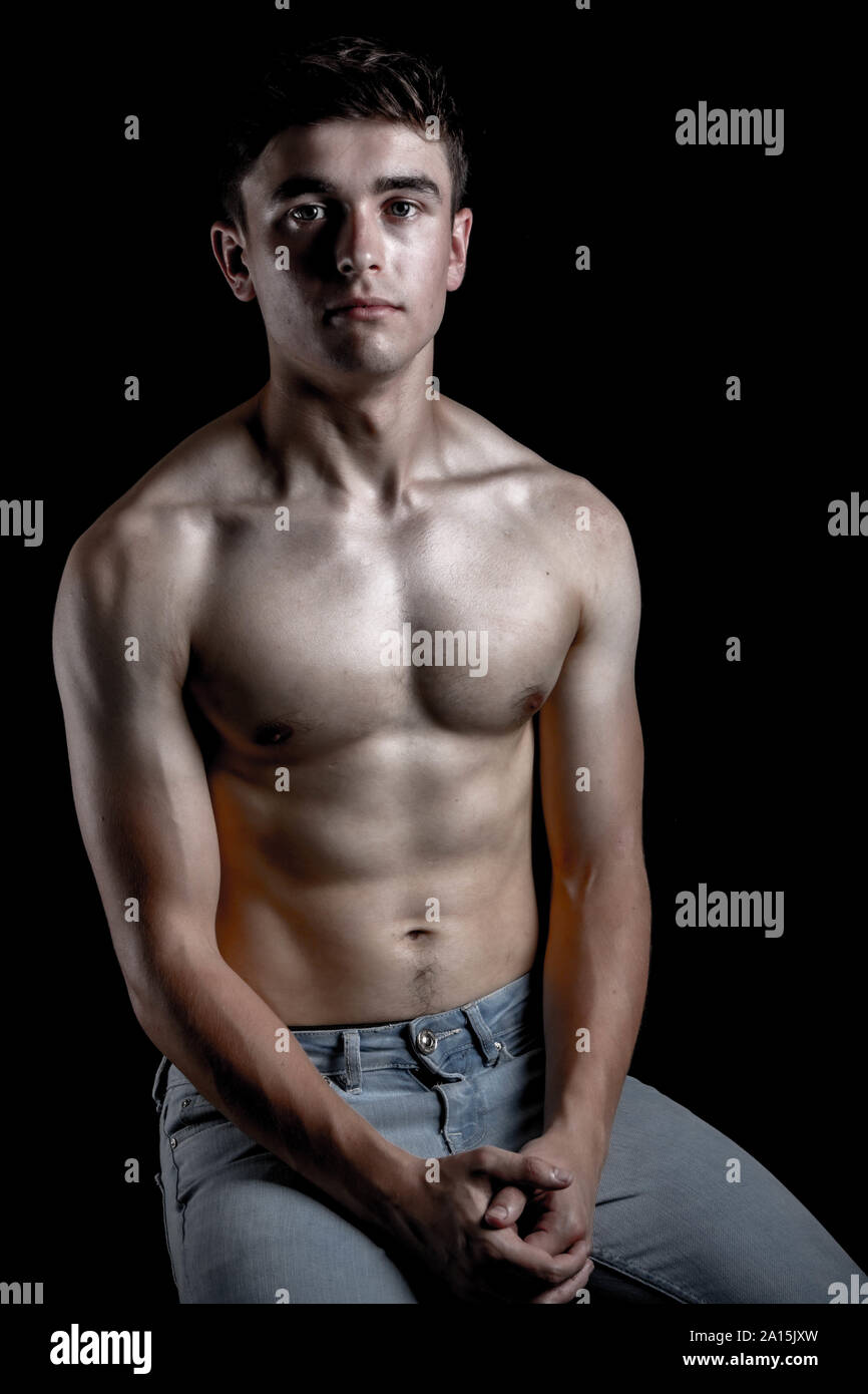 Low Key Studio Portrait Of A Young Adult Caucasian Male Shirtless ...