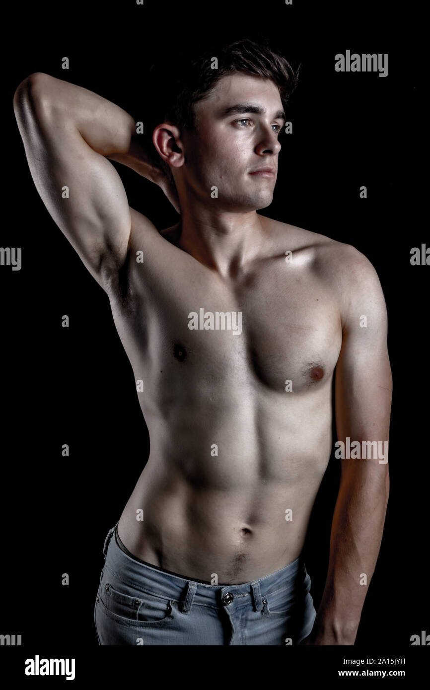Low Key Studio Portrait Of A Young Adult Caucasian Male Shirtless ...
