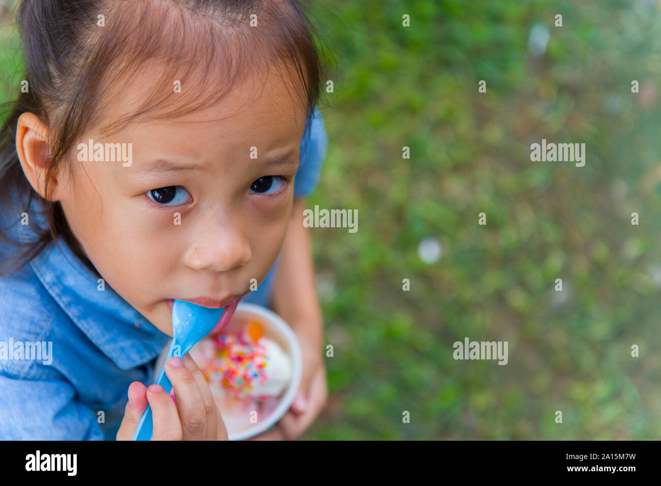 Baby eating mango hi-res stock photography and images - Alamy