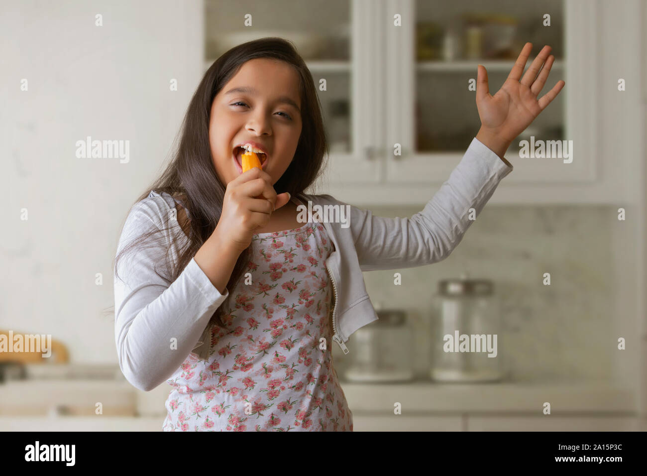 Girl eating carrot hi-res stock photography and images - Alamy