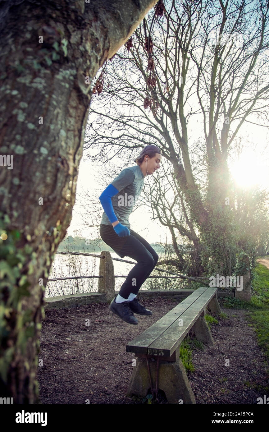 A young man jumping hi-res stock photography and images - Alamy