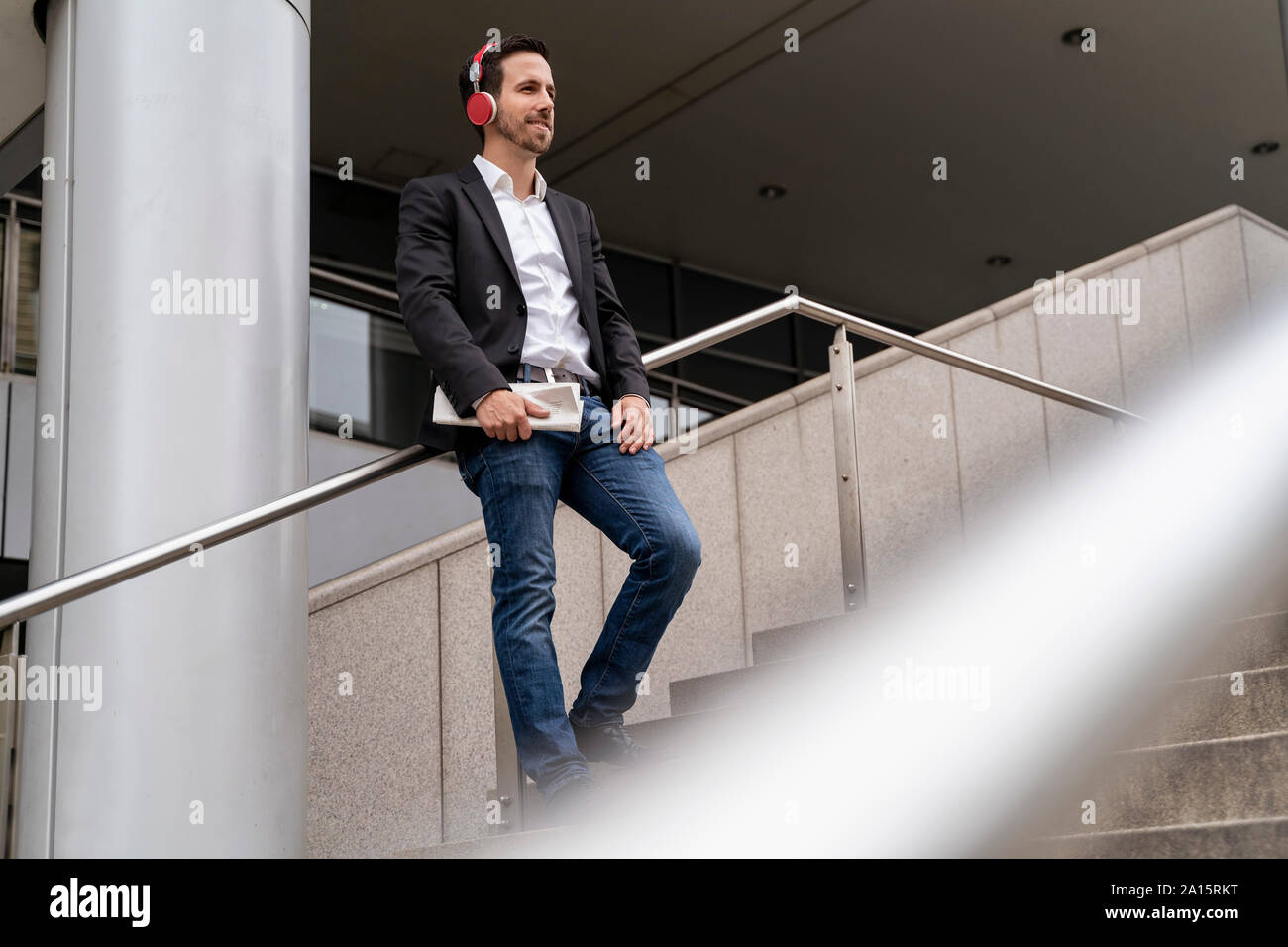 Man standing in stairs hi-res stock photography and images - Alamy
