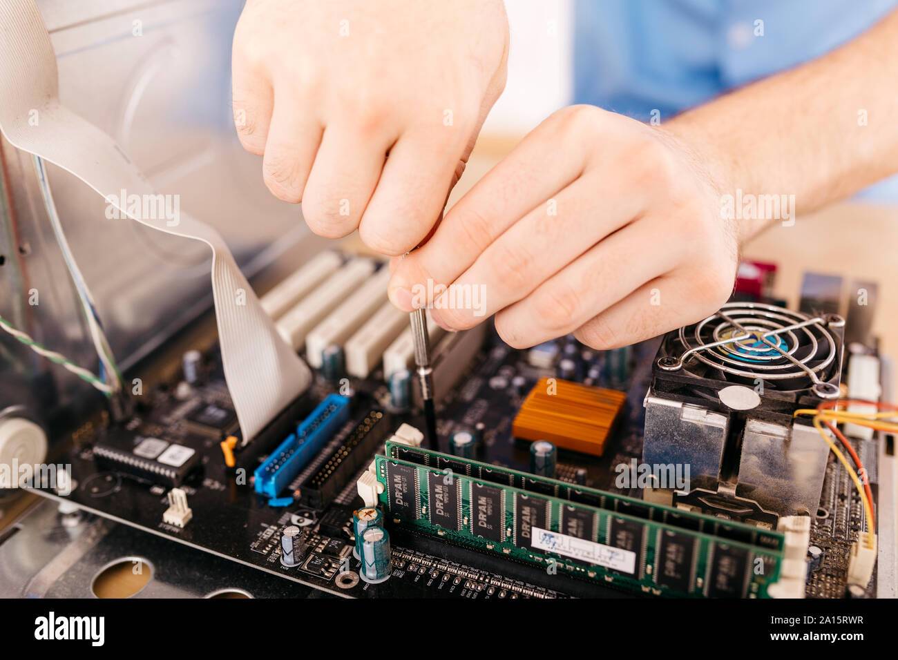 Close up of technician repairing a desktop computer hi-res stock ...