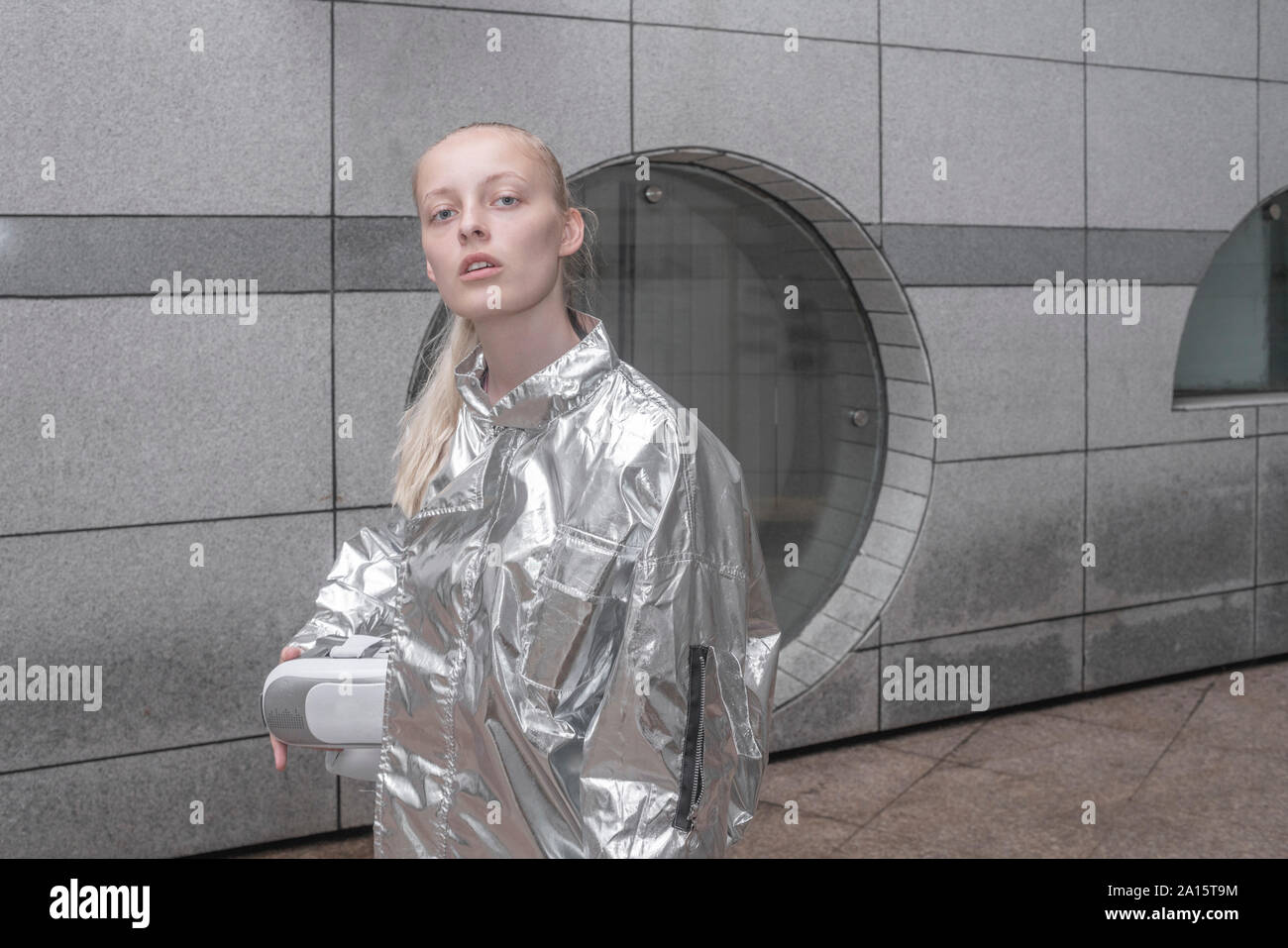 Carrying under arm hi-res stock photography and images - Alamy