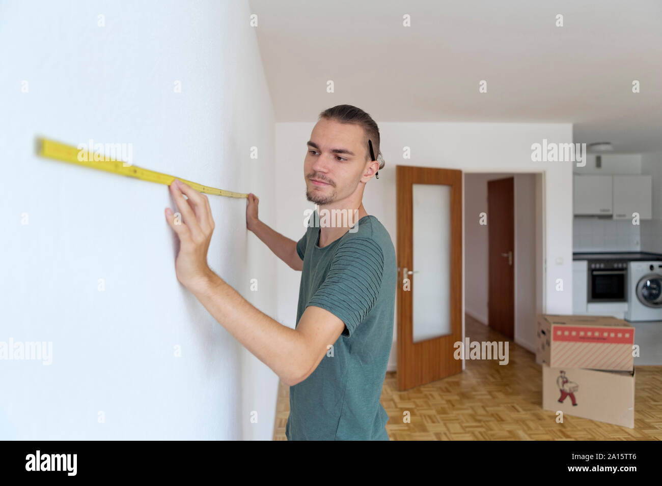 Floor Man Measuring Room High Resolution Stock Photography and Images ...
