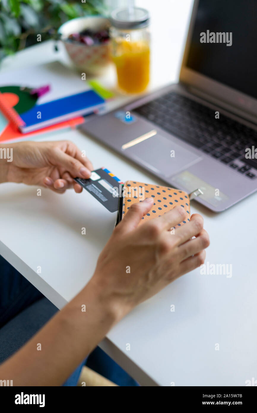 Person laptop purse hi-res stock photography and images - Alamy