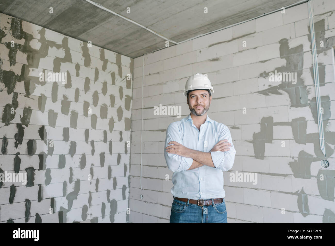 Portrait of architect on construction site Stock Photo - Alamy