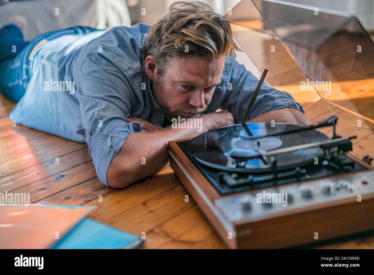 Old man lying floor hi-res stock photography and images - Alamy