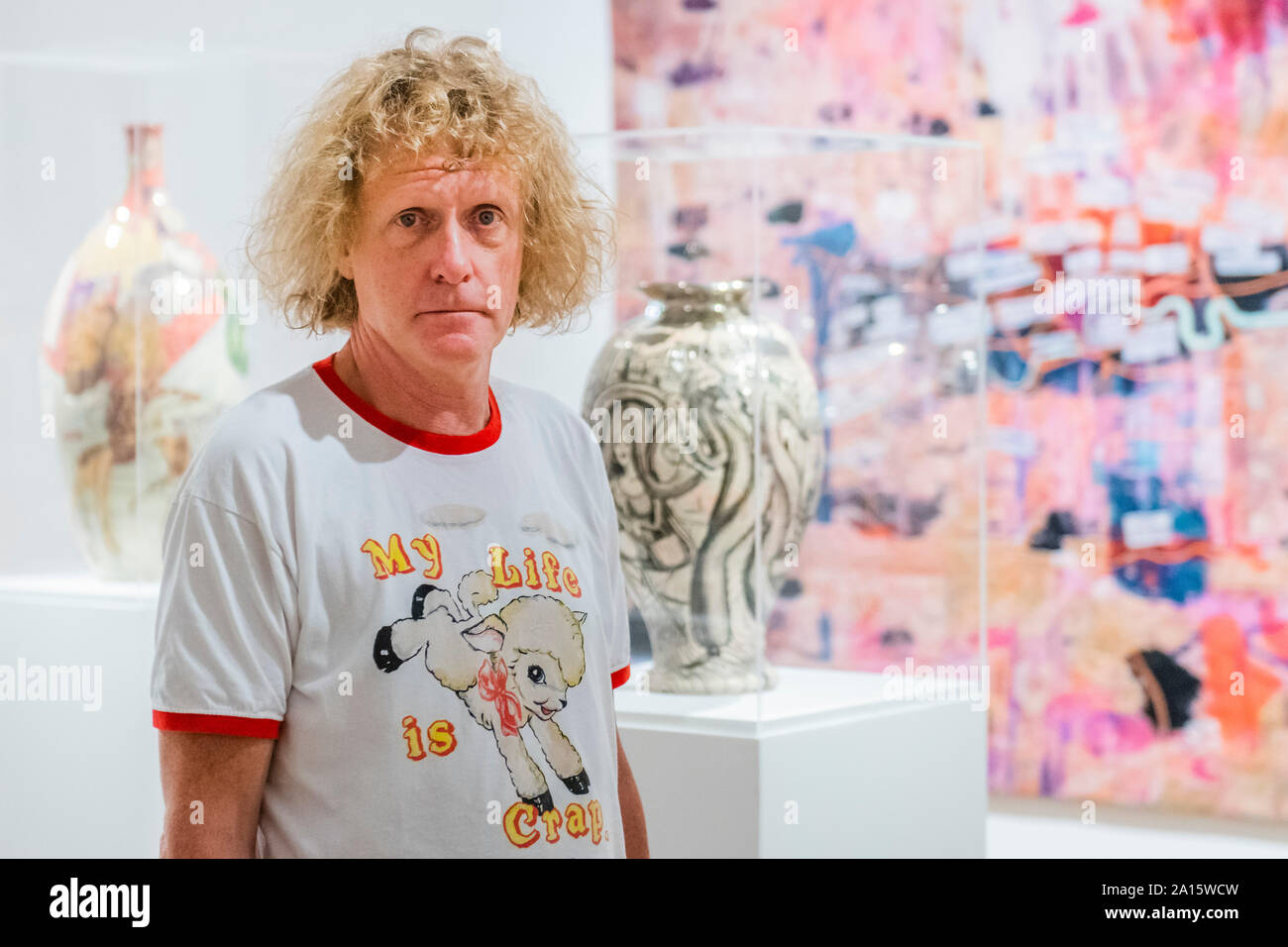 London, UK. 24th Sep 2019. Grayson Perry (pictured in a room full of ...