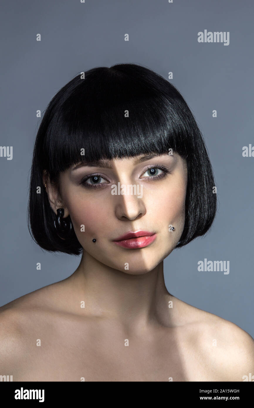 Cheek piercing hi-res stock photography and images - Alamy