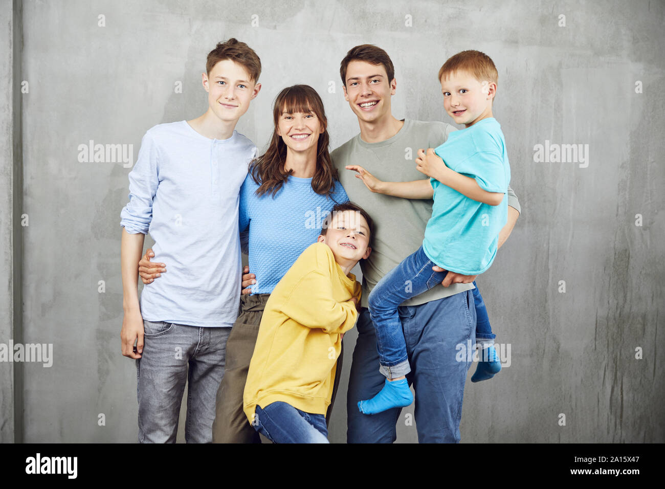 Mother with her four sons Stock Photo - Alamy