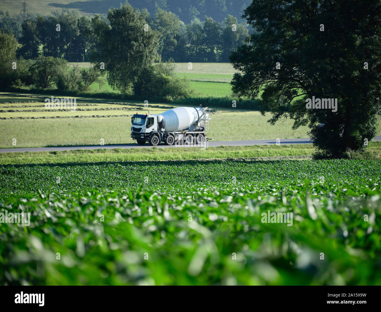 Light truck moving along road hi-res stock photography and images - Alamy