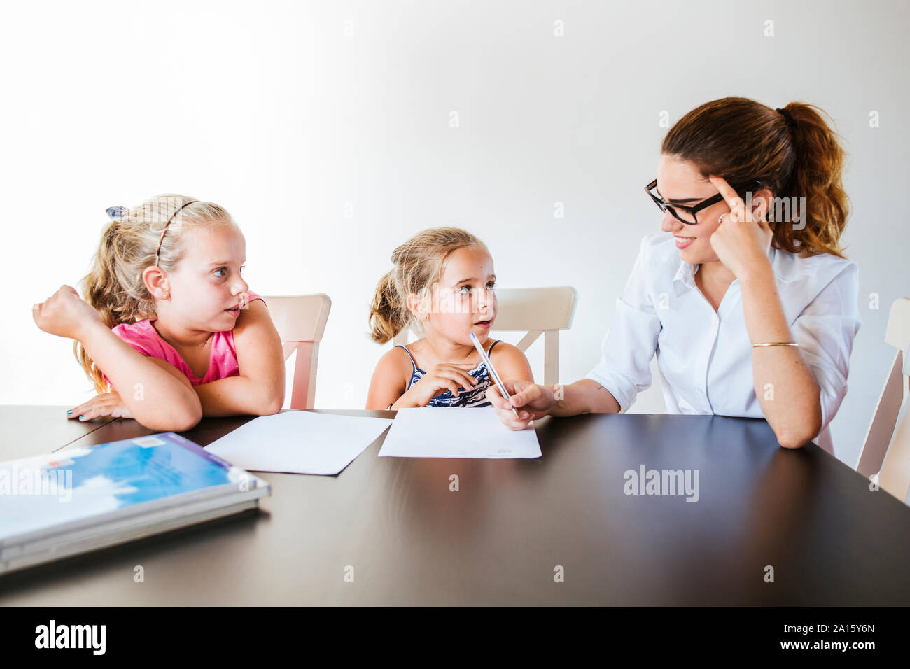 Student writing paper desk hi-res stock photography and images - Alamy