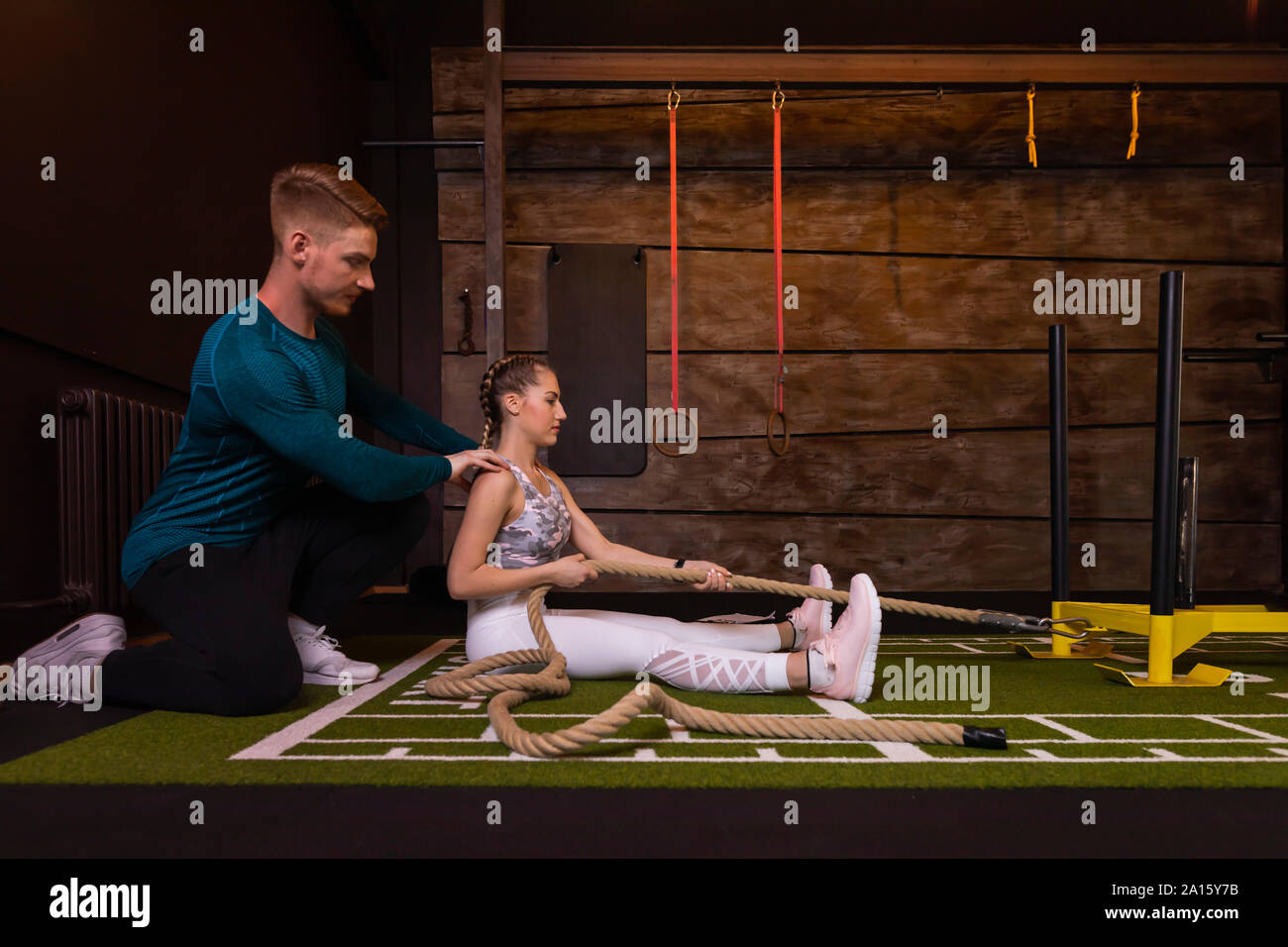 Woman pulling rope hi-res stock photography and images - Alamy