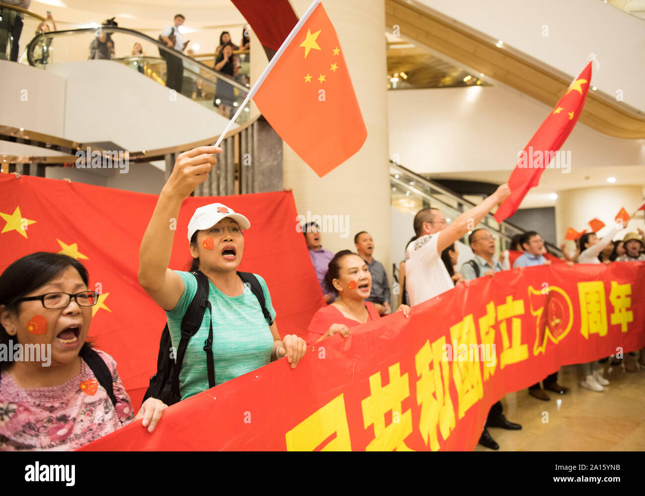 Hong Kong, China. 24th Sep, 2019. People attend a patriotic flash mob ...