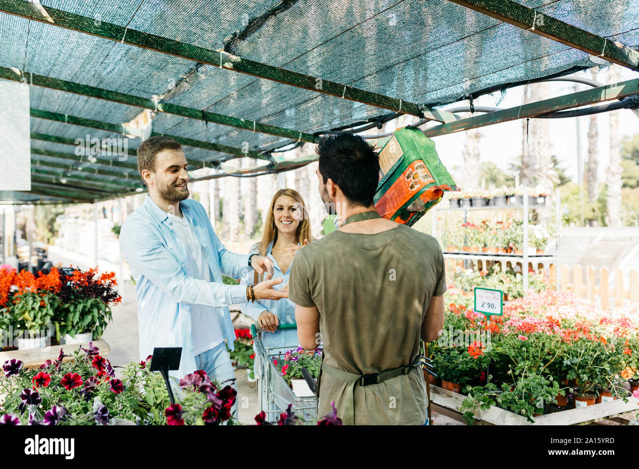 Handing plant hi-res stock photography and images - Alamy