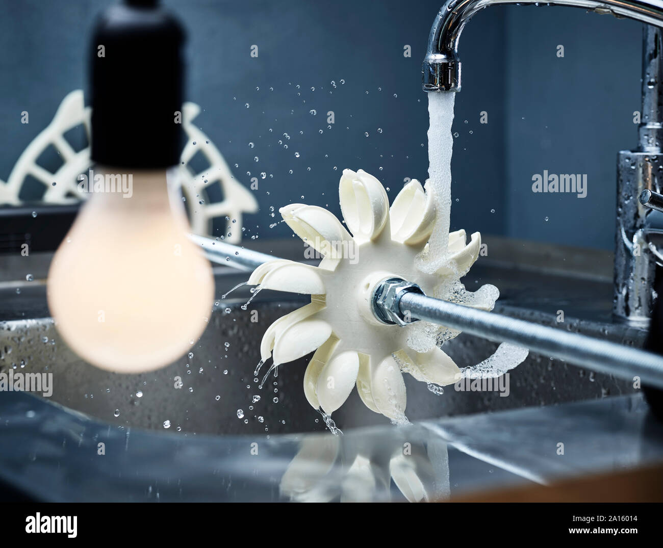 Light bulb and turbine wheel being tested for power generation Stock ...