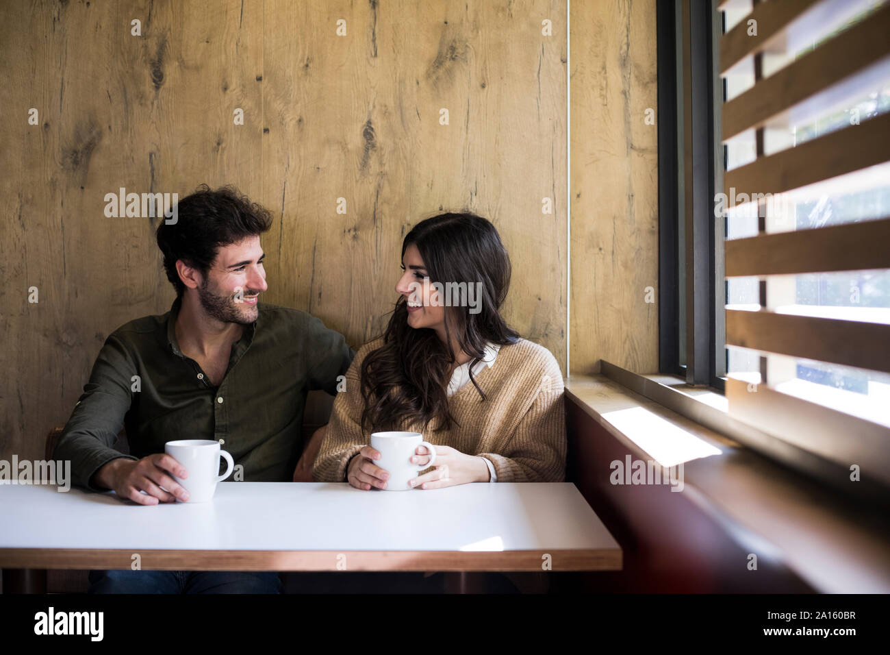 Brown couple coffee shop hi-res stock photography and images - Alamy