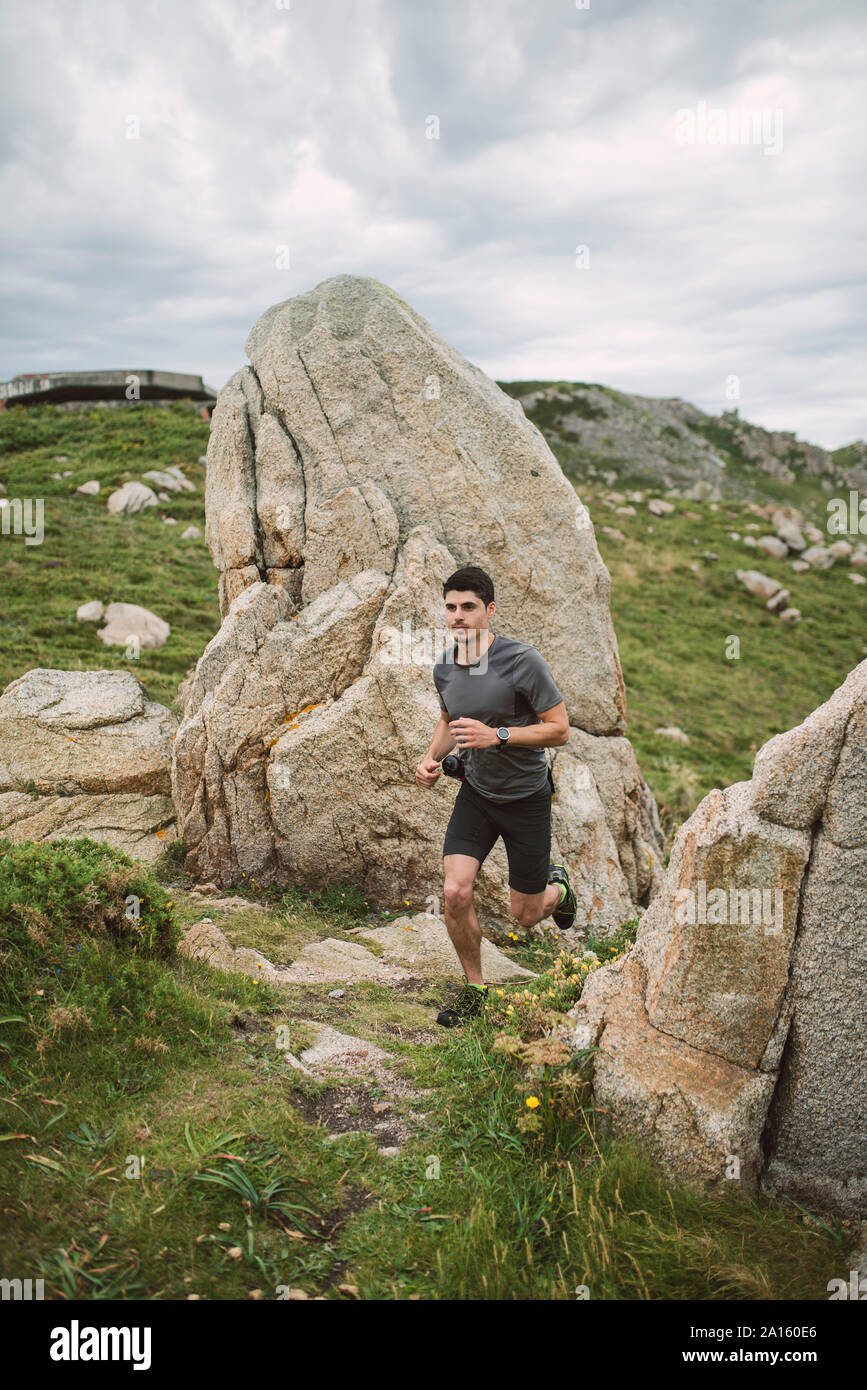 Trail runner in coastal landscape hi-res stock photography and images ...