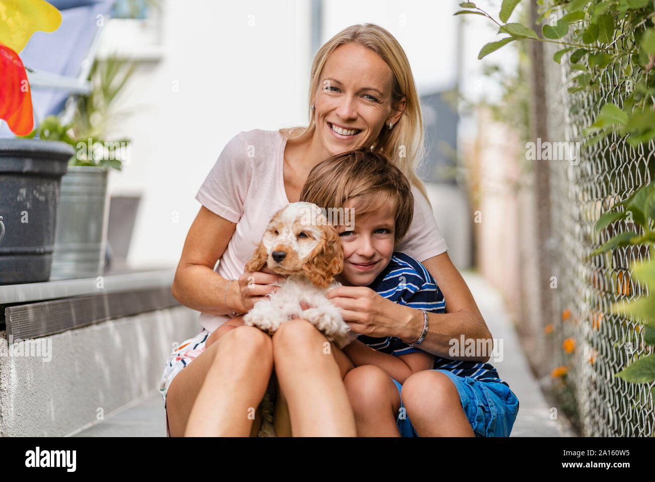 Cocker spaniel puppy children hi-res stock photography and images - Alamy