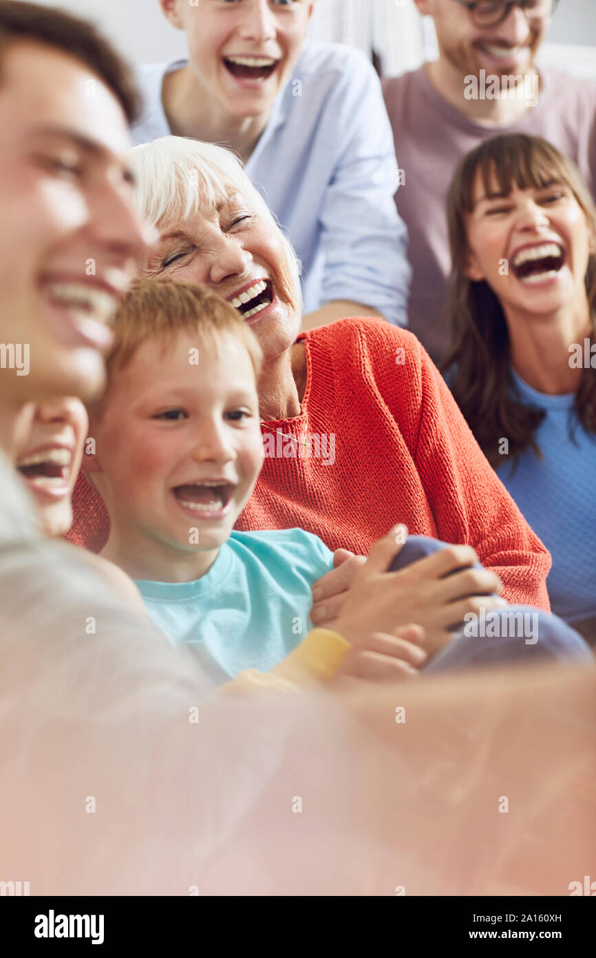 Three generations family having fun at home Stock Photo - Alamy