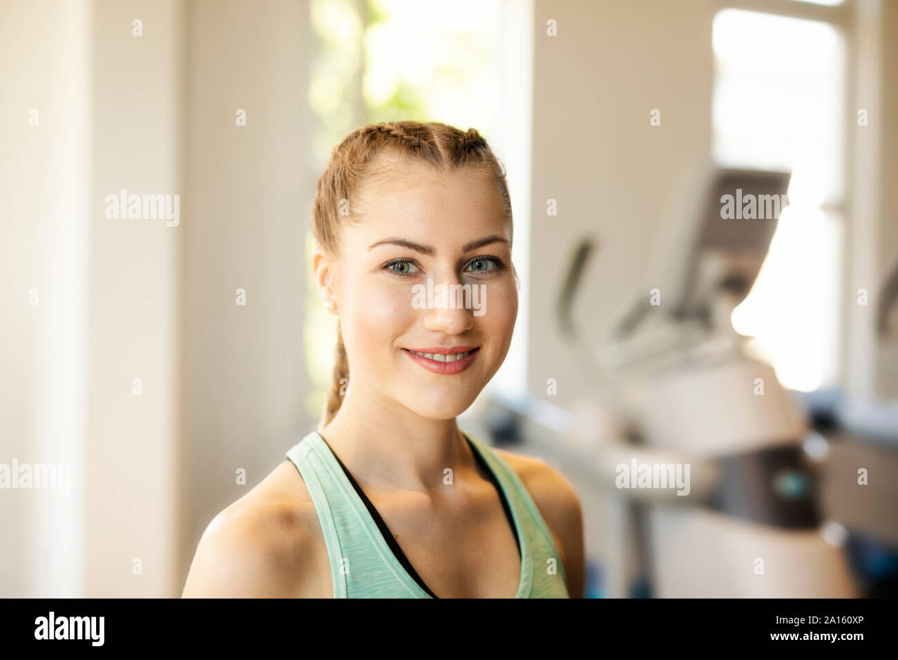 Young beautiful woman in a gym hi-res stock photography and images - Alamy