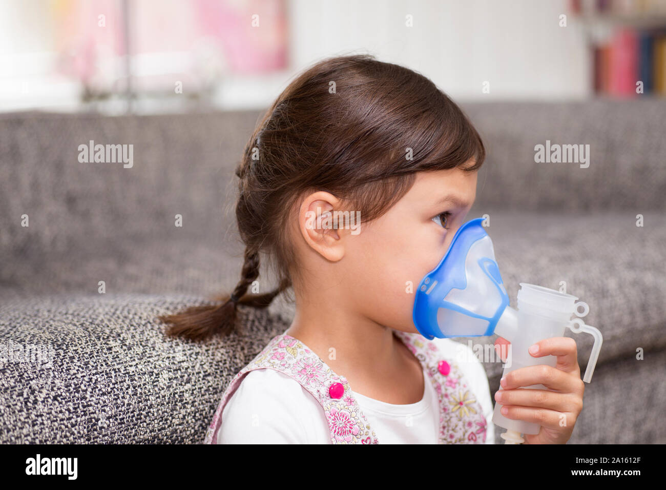 Person using inhaler hi-res stock photography and images - Alamy