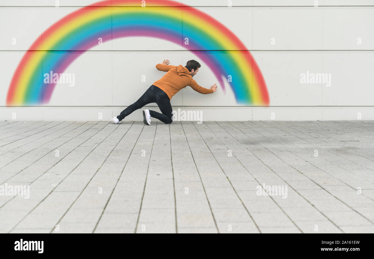 Rainbow Painting Of Man Logo