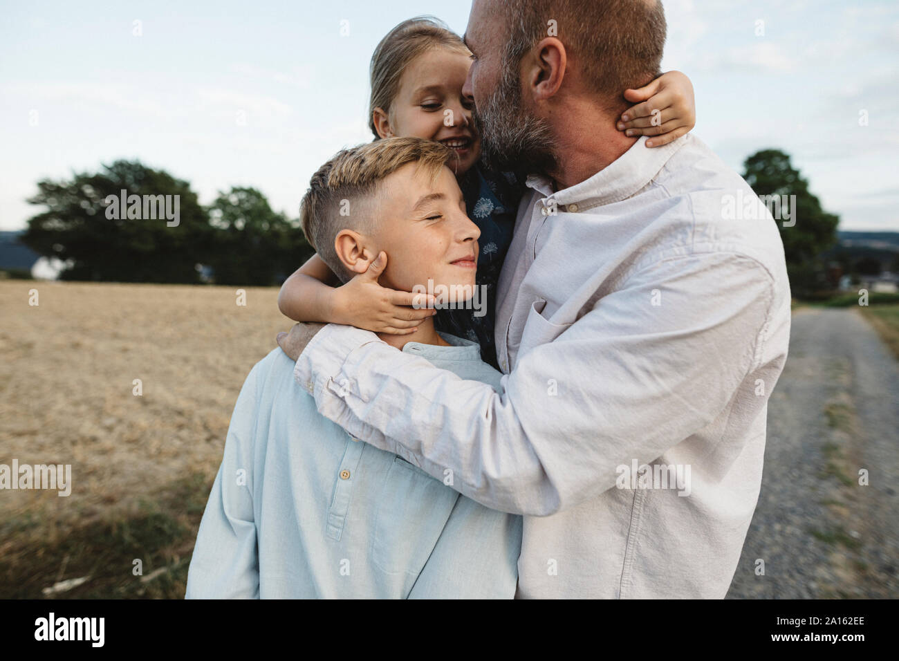 Two children hugging hi-res stock photography and images - Alamy