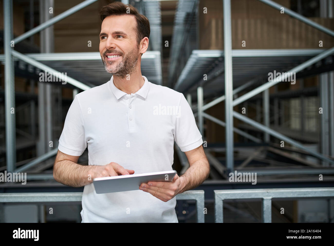 Online employee man tablet hi-res stock photography and images - Alamy