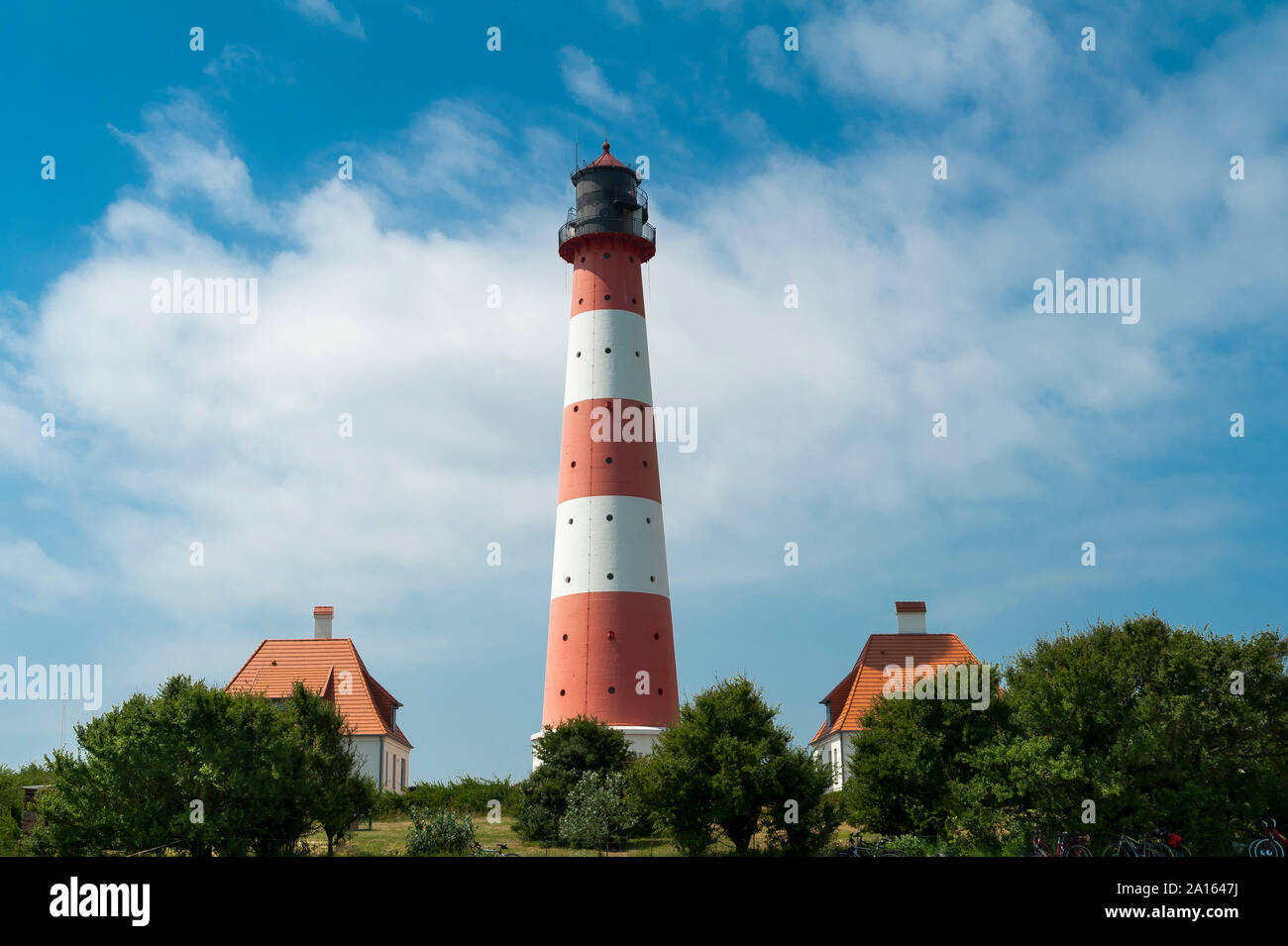 Westerhever lighthouse with cloud sky hi-res stock photography and ...