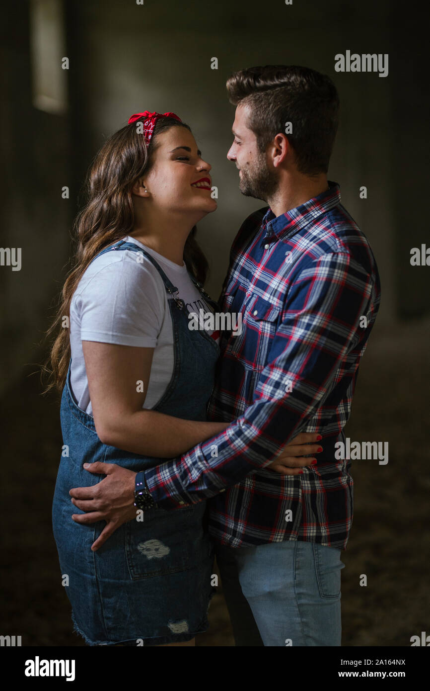 Young couple caressing each other Stock Photo - Alamy