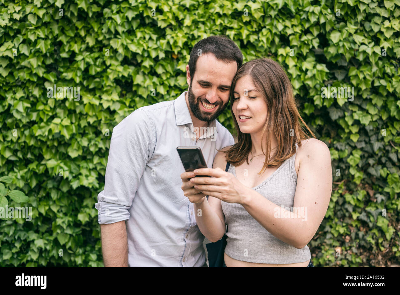 Positive young people sharing hi-res stock photography and images - Alamy