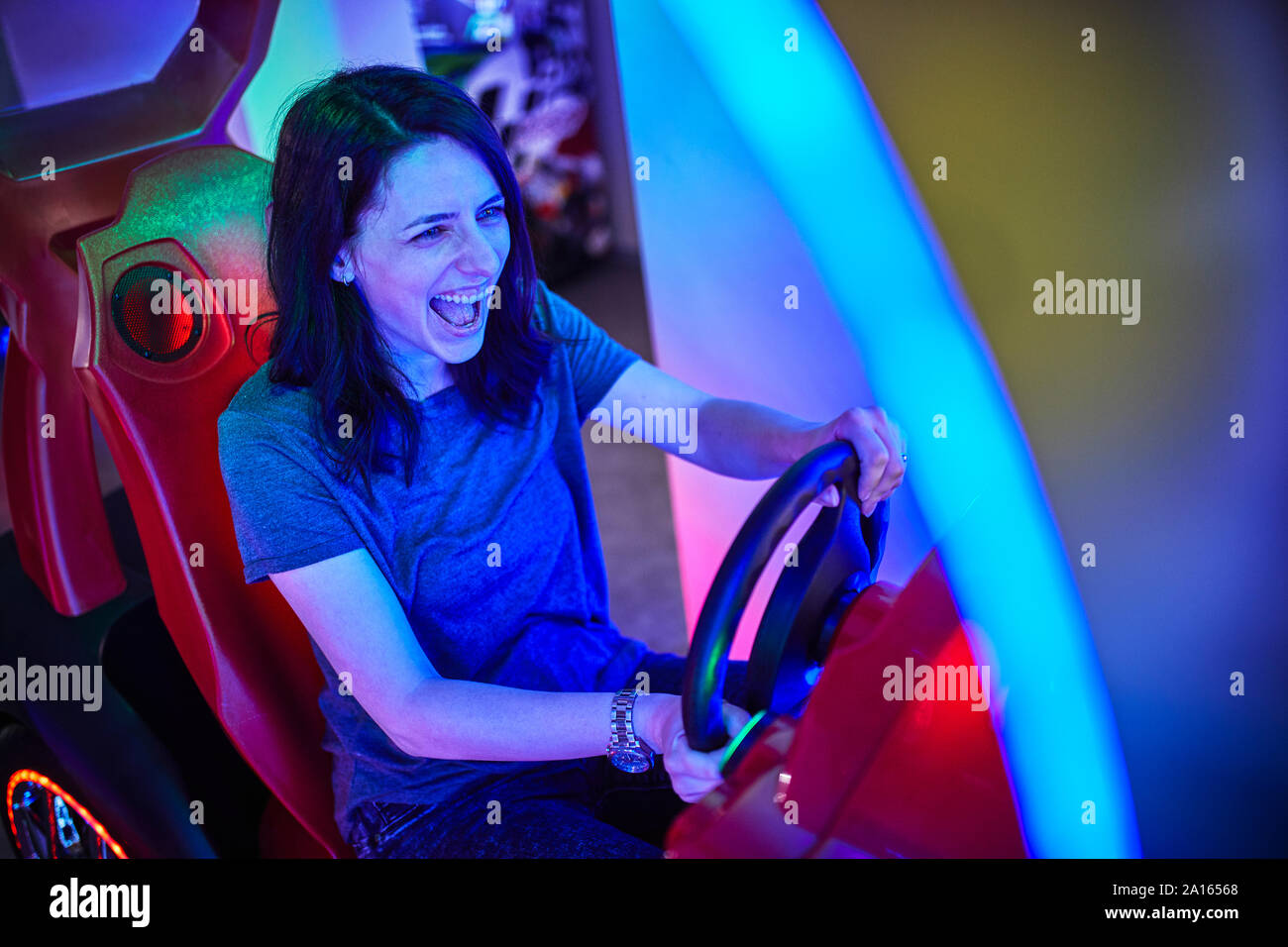 Woman in driving simulator hi-res stock photography and images - Alamy