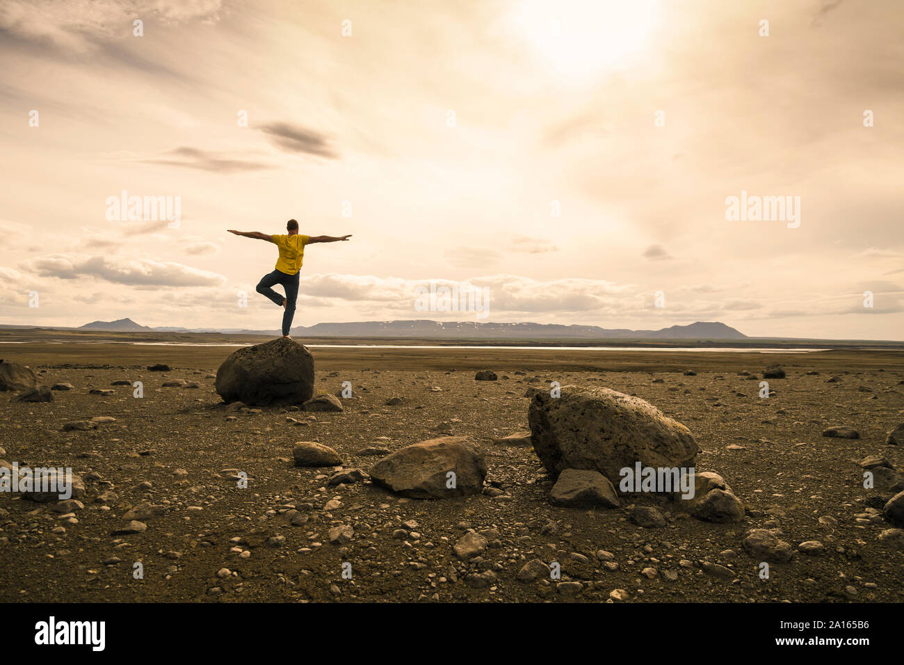 Man balancing on rock hi-res stock photography and images - Alamy